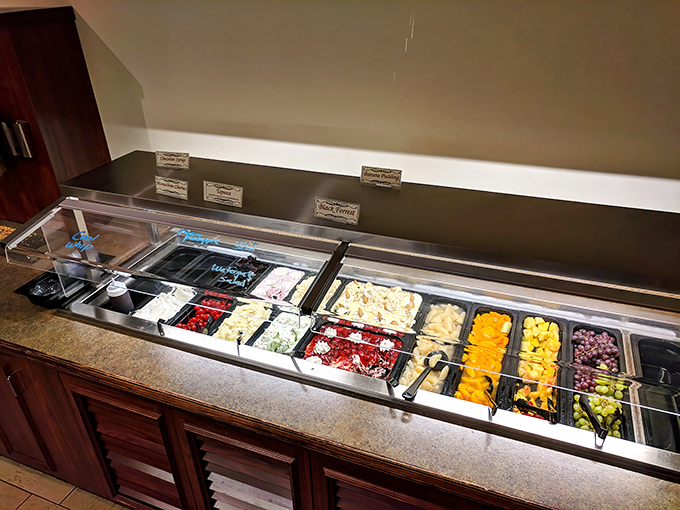 A rainbow of fresh fruit awaits the virtuous—or those creating the illusion of balance before hitting the pie section.