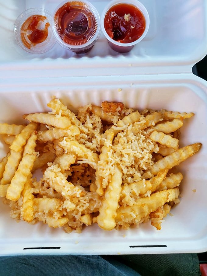 Garlic fries with three dipping sauces—because sometimes one condiment simply cannot contain all your feelings about fried potatoes.