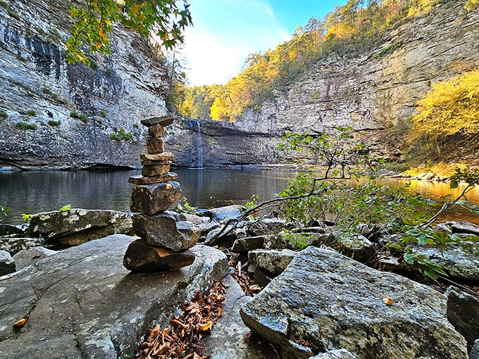 Stone stacking: the original Instagram post. This peaceful scene at the base of the falls proves meditation doesn't require fancy apps or uncomfortable sitting positions.