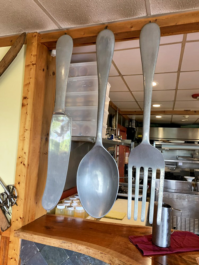 These oversized utensils aren't just whimsical décor—they're a not-so-subtle hint that big flavors await. Size matters when it comes to both silverware and satisfaction.