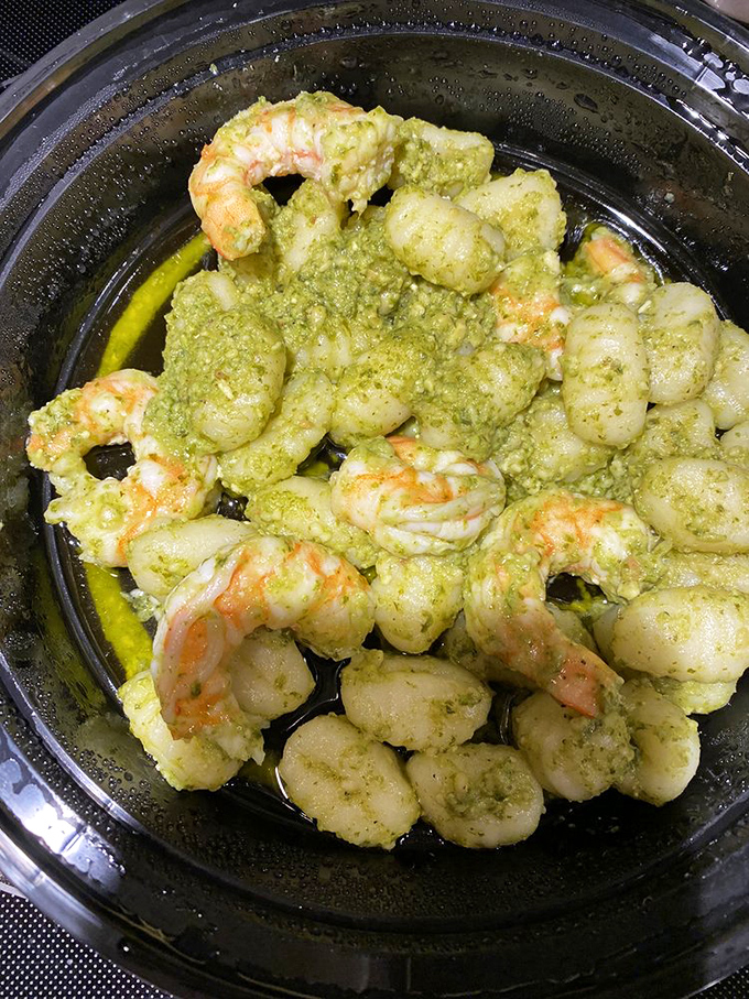 These pesto shrimp aren't just seafood—they're little green-jacketed ambassadors from flavor country, swimming in herb-infused goodness.