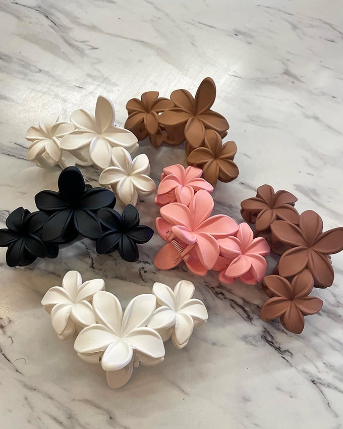 Colorful hair accessories prove that sometimes the smallest details make the biggest fashion impact statements.