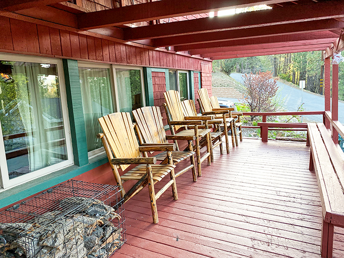 Porch sitting elevated to an art form—where rocking chairs and mountain views combine for nature's stress therapy.
