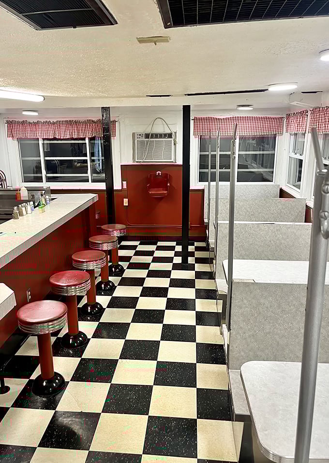 The classic black-and-white checkered floor isn't retro design—it's simply never changed. Why mess with the backdrop to burger perfection?