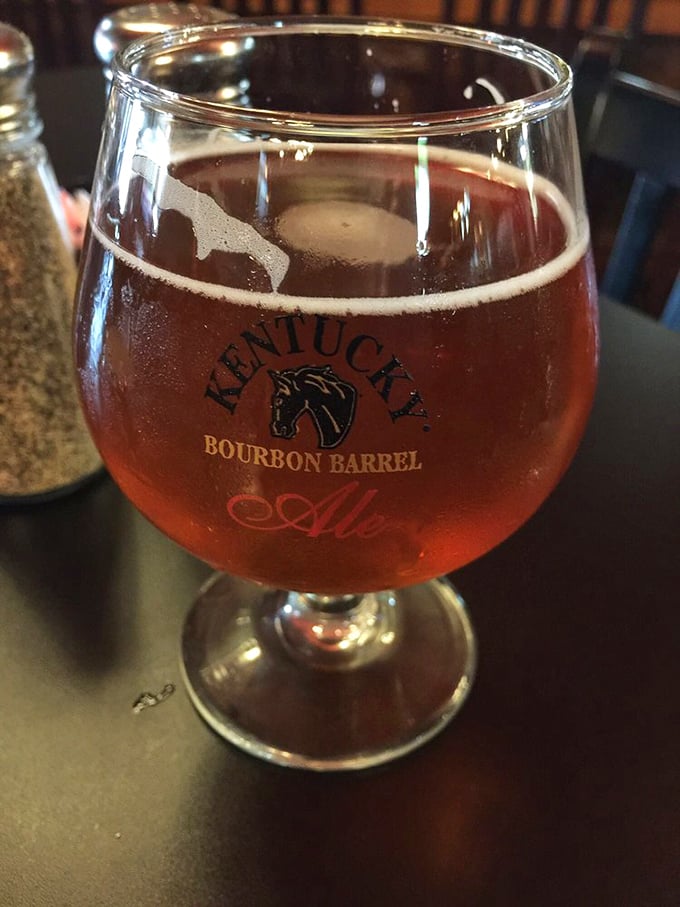 A Kentucky Bourbon Barrel Ale catching the light just right—liquid amber that tastes like oak-aged happiness.