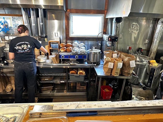 Behind the scenes, where the magic happens. Fresh bread bowls waiting to be filled with creamy chowder—a backstage pass to culinary theater.