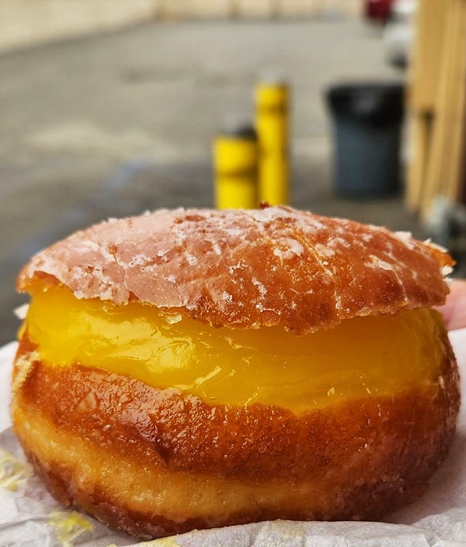 This lemon donut isn't just breakfast—it's sunshine with a hole in the middle. Worth every minute spent waiting in line.
