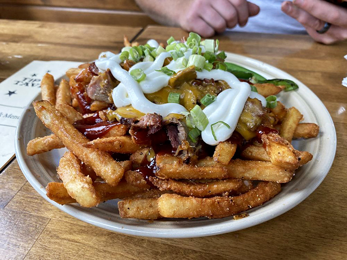These aren't just fries – they're a canvas for toppings that transform the humble potato into something worth fighting over.