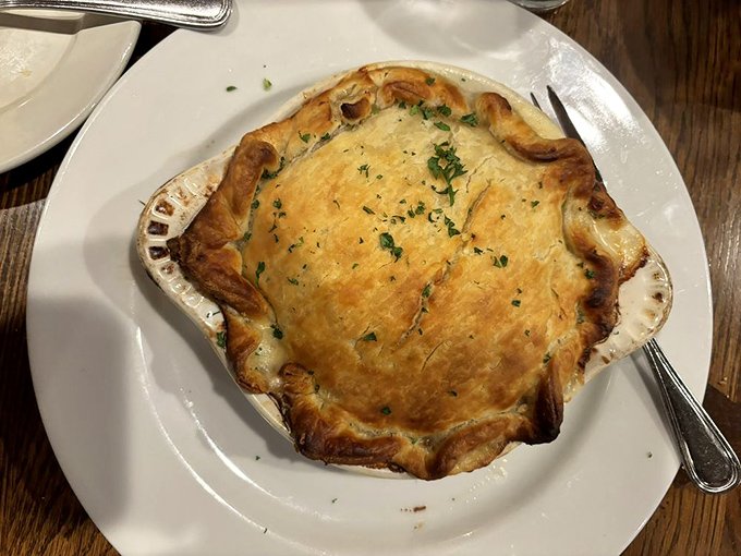 This lobster pie's golden crust hides a treasure of seafood beneath, like Neptune himself baked it as a gift to landlocked Pennsylvanians.