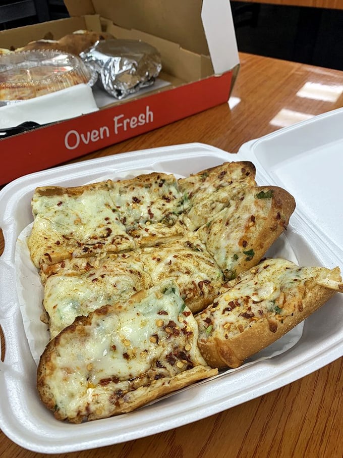 What looks like masala garlic bread – the culinary equivalent of the best buddy movie ever. Italian carbs meet Indian spices in perfect harmony.