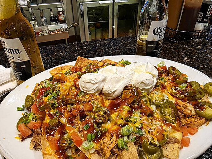 These loaded nachos aren't just a appetizer—they're an architectural achievement that deserves its own zip code.