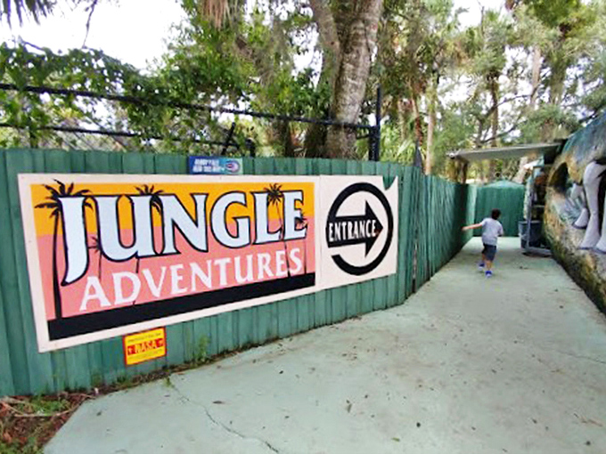 The "Jungle Adventures" sign promises exactly what it delivers—a slice of old Florida that theme parks can't replicate.