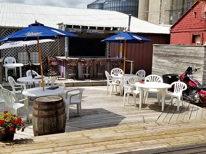 The outdoor patio—where summer evenings stretch into night, cold drinks stay cold, and conversations get warmer as the sun sets.