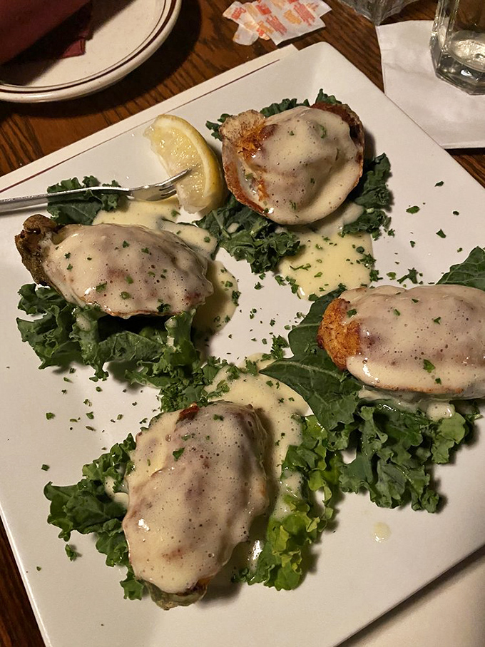 Oysters Maryland arrive like jewels on a bed of greens, topped with a sauce so good you'll be tempted to ask for the recipe.