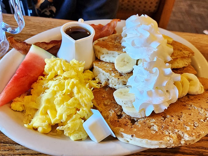 Pancakes adorned with whipped cream mountains and fresh fruit – the breakfast equivalent of winning the lottery on your birthday.