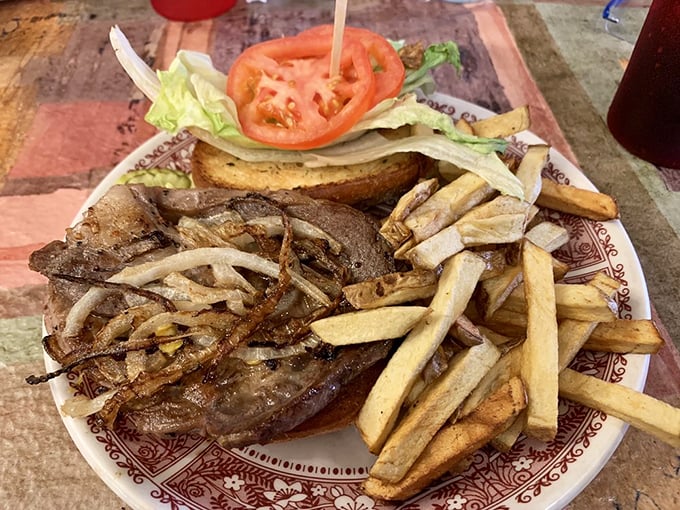
This isn't just a burger—it's a patty melt masterpiece, where caramelized onions and melted cheese transform beef into something transcendent.