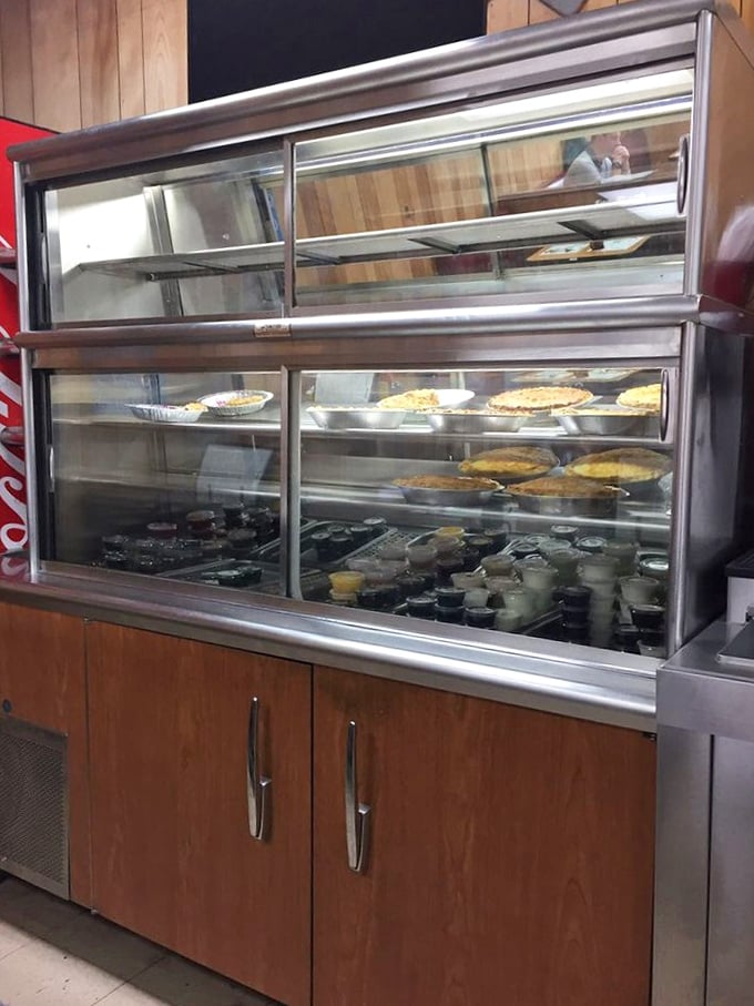 The pie case isn't just displaying desserts—it's showcasing edible art that makes waiting for a table almost bearable.