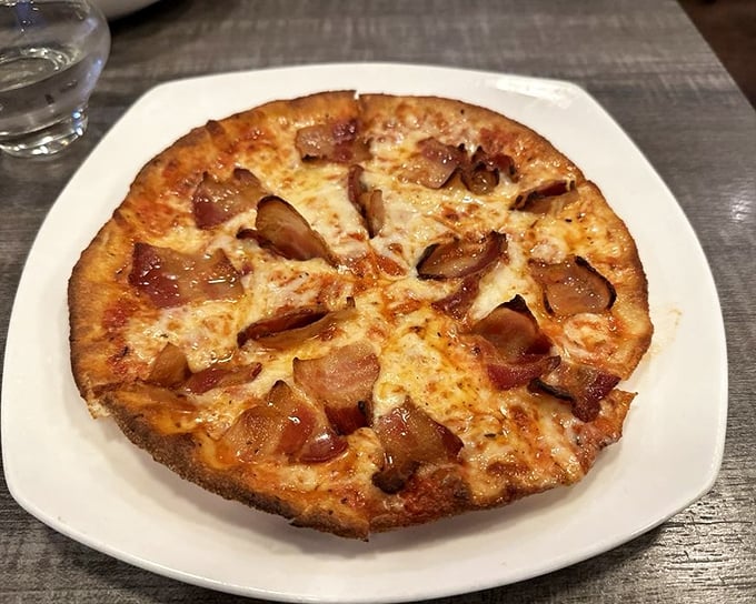 Pizza that answers the eternal question, "Can bacon make everything better?" with a resounding, cheese-pulling "Absolutely!"