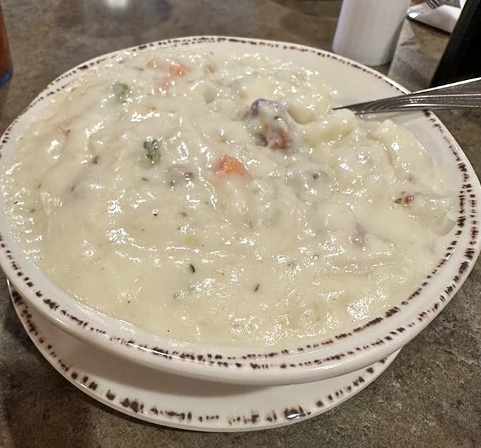 This potato soup doesn't just warm your stomach—it hugs your soul. Creamy, hearty, and thick enough to stand a spoon in.