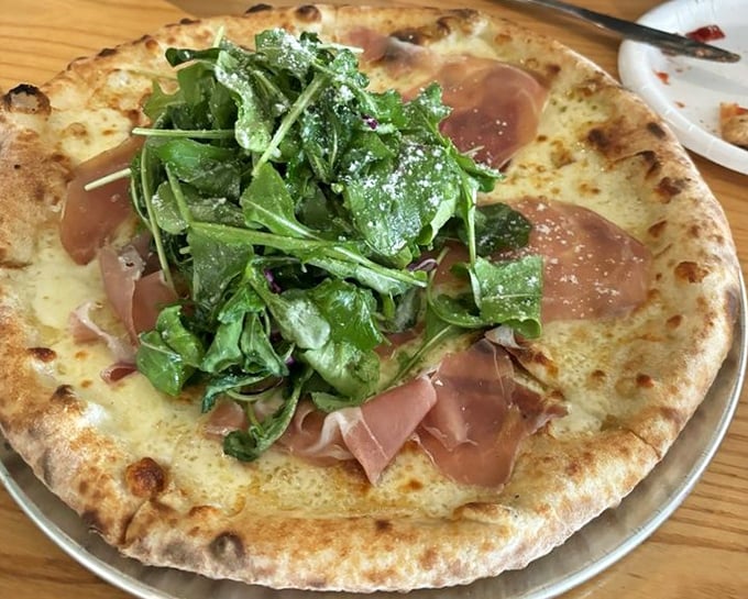 Prosciutto and arugula: the Fred Astaire and Ginger Rogers of pizza toppings—elegant, perfectly matched, and impossible to improve upon.