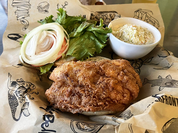This isn't just a fish sandwich—it's a monument to the mighty grouper, proudly displaying its crispy credentials alongside creamy coleslaw.