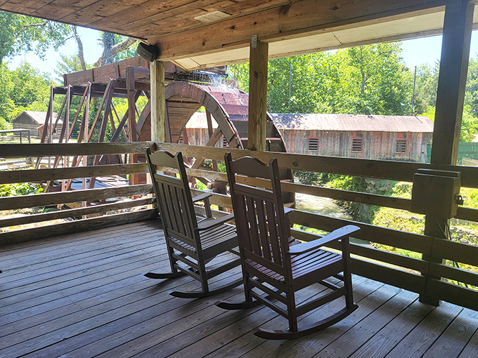 Two rocking chairs with a waterwheel view—nature's version of dinner and a show, minus the overpriced tickets.
