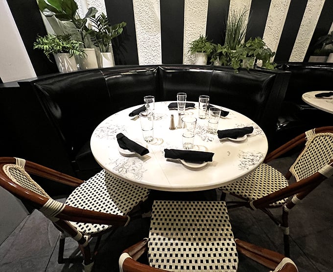 A table set with military precision against a backdrop of bold stripes. The stage is set for culinary drama to unfold.