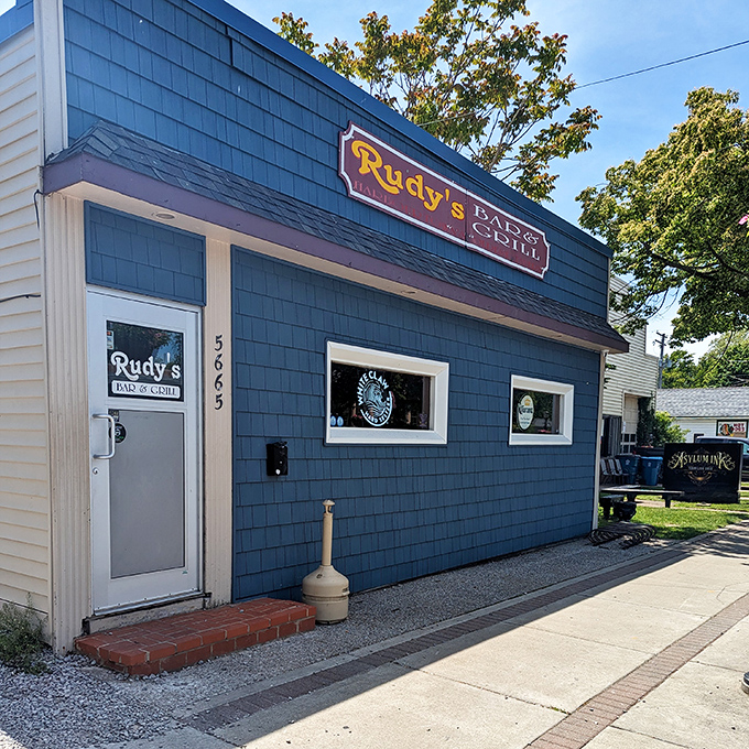 Rudy's Bar & Grill – that perfect small-town watering hole where everybody might not know your name yet, but they will by closing time. 