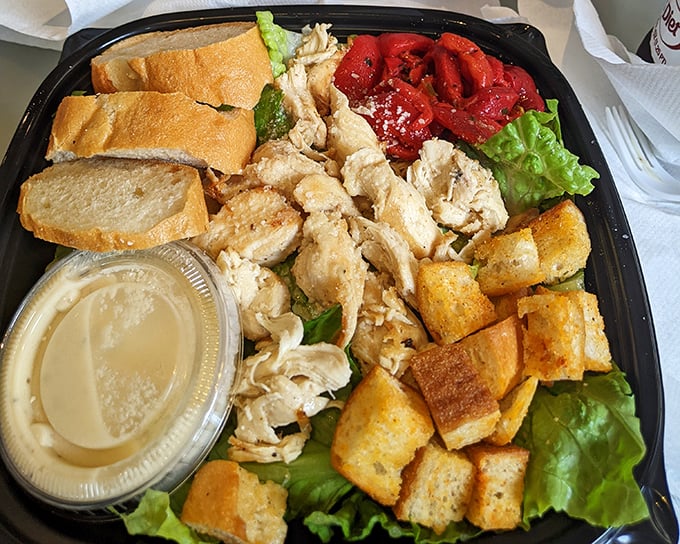 The chicken Caesar salad – where "eating healthy" and "eating happy" find common ground. Those croutons deserve their own fan club.