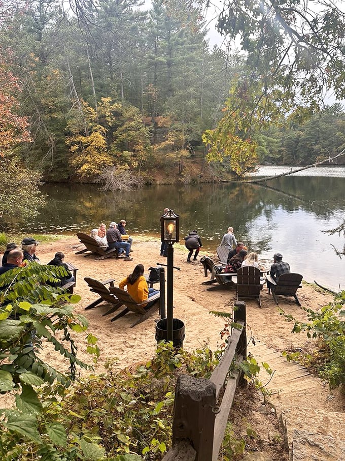 The lakeside waiting area turns anticipation into pleasure, with Adirondack chairs perfectly positioned for that "wish you were here" moment.