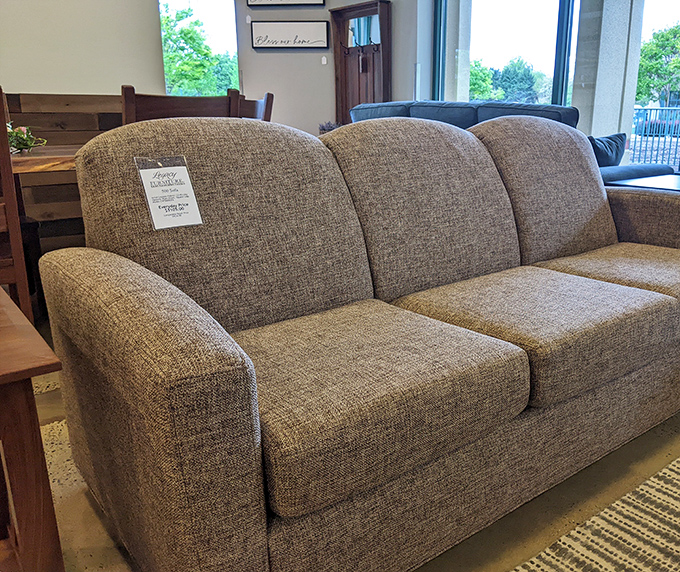 The sofa of your dreams isn't just comfortable—it's attainable. This neutral beauty waits patiently for someone to recognize its living room potential.