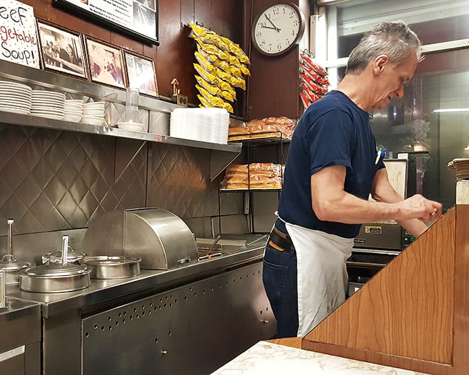 Craftsmanship in action. Watching skilled hands prepare your meal is part of the Duly's experience—no fancy chef's whites needed.