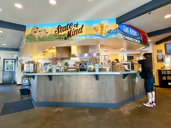 The open kitchen isn't just for show—it's dinner and a performance. Watch pizza artisans craft your soon-to-be favorite meal.