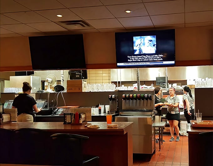 Where the magic happens—the open kitchen design lets you watch your Wisconsin classics being prepared with practiced precision.