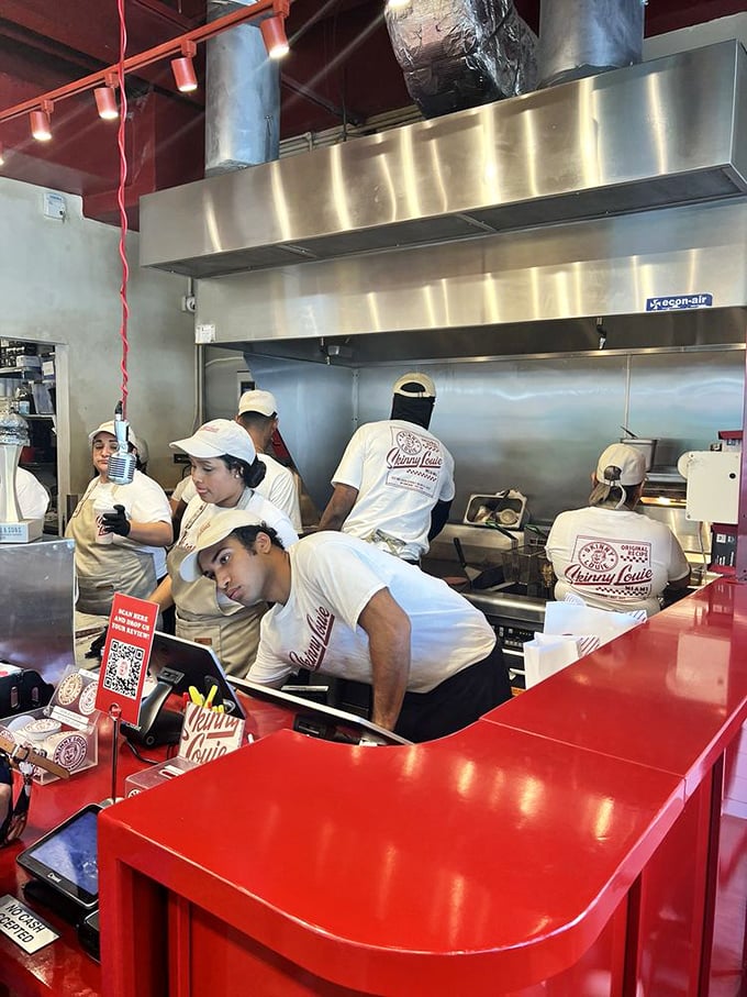 The kitchen crew works with the precision of a well-oiled machine, turning simple ingredients into edible art with practiced efficiency.
