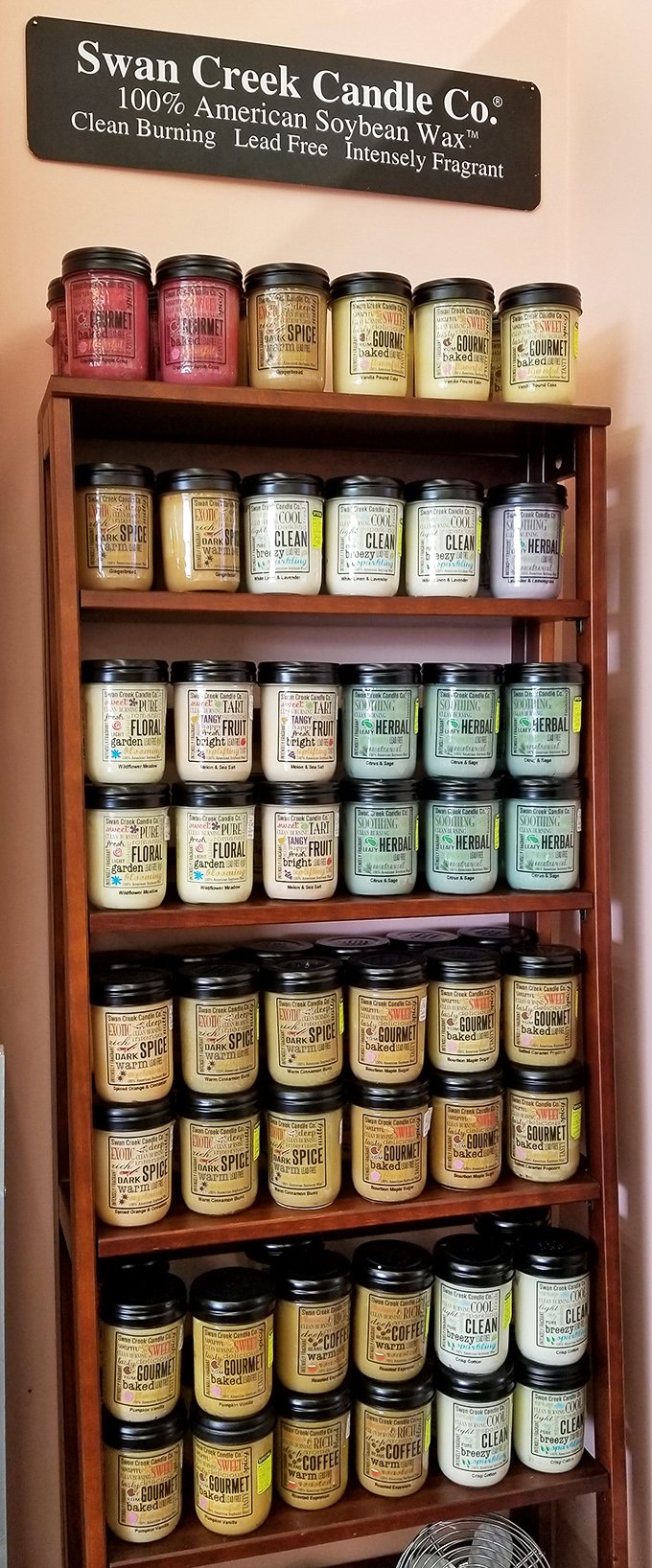 Swan Creek Candles lined up like soldiers ready for aromatic battle. Your nose will thank you, even if your wallet protests.