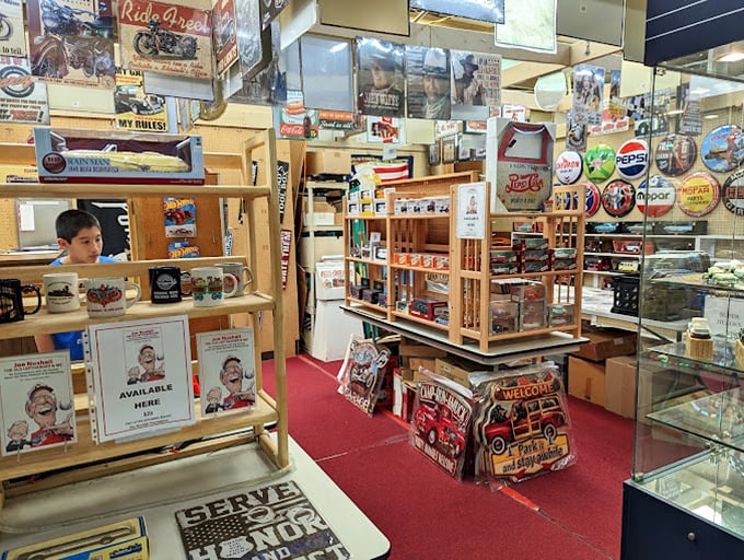 This booth is a time capsule of Americana where every vintage sign and collectible tells a story about what we used to value.