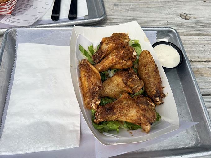 These wings might make you question everything you thought you knew about a seafood joint. They're not playing fair, and we're all better for it.