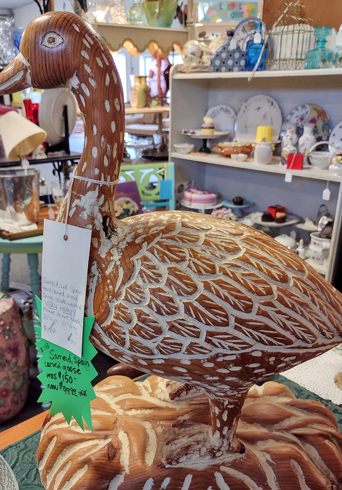 Not your average lawn ornament! This hand-carved wooden goose has more personality than most characters on reality television.