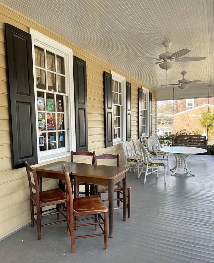 Al fresco dining, Southern style. This porch doesn't just offer seating—it offers perspective on a slower, more civilized approach to mealtime.