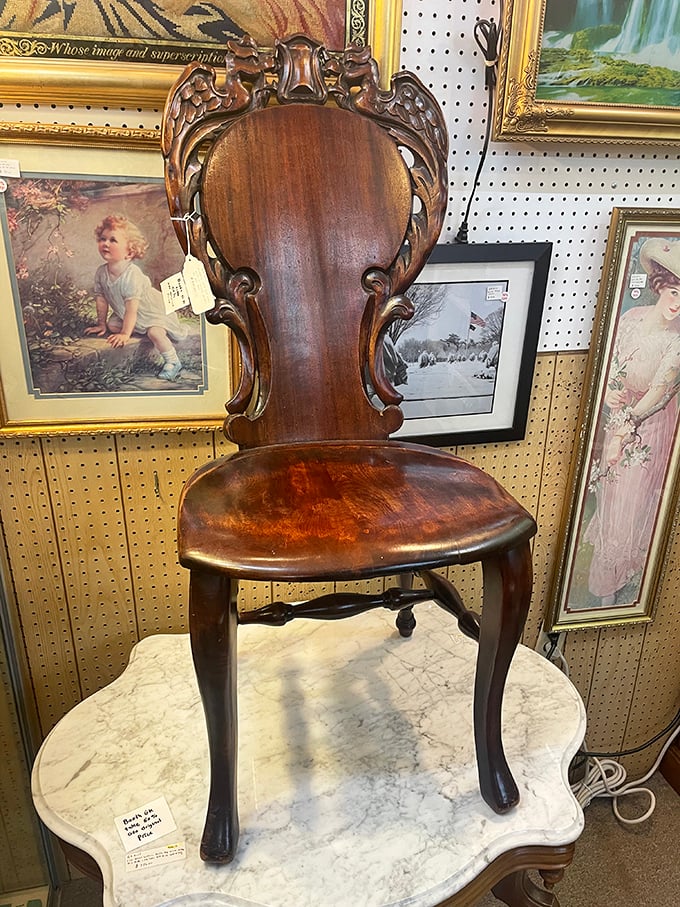 This carved wooden chair isn't just furniture—it's functional sculpture. Someone important once sat here, or at least someone who thought they were important.