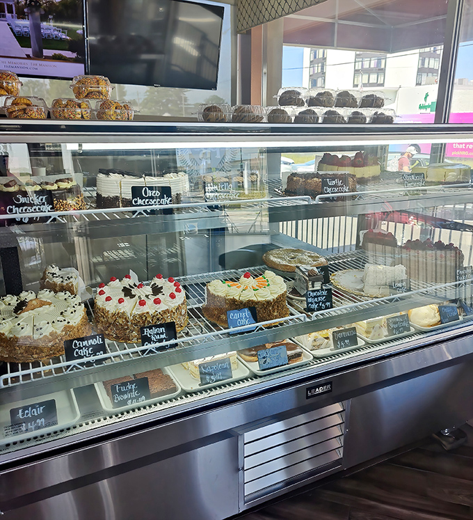 The dessert case – where willpower goes to die and "I'll just have coffee" transforms into "and a slice of that... and that..."