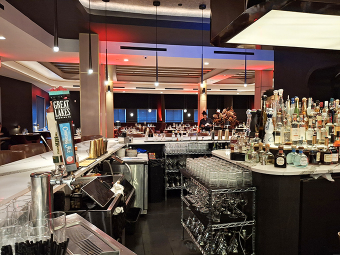 The bar at Fahrenheit isn't just stocked—it's an arsenal of liquid possibilities with enough glassware to survive a very sophisticated apocalypse.