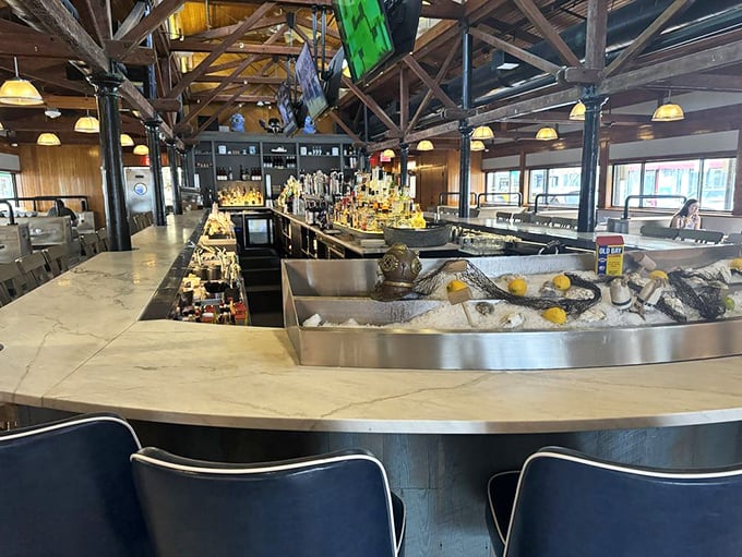 The bar and raw display showcase the day's catch on ice—nature's artwork waiting to become your dinner.