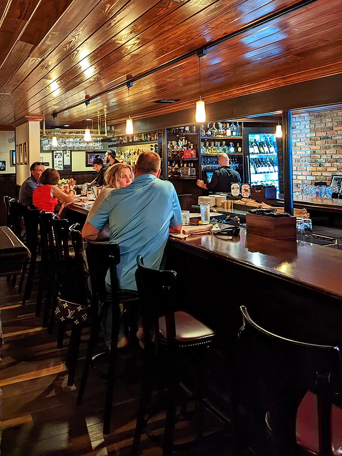 A bar where strangers become friends and friends become family, all bonded by the shared religion of exceptional food and drink.