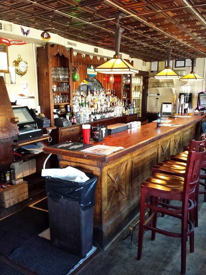 The well-worn wooden bar feels like it could tell a thousand maritime tales—if only you'd stay for another round to listen.
