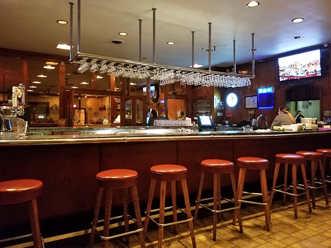 The bar: where strangers become friends and friends become family over glasses of liquid courage before tackling the porterhouse.