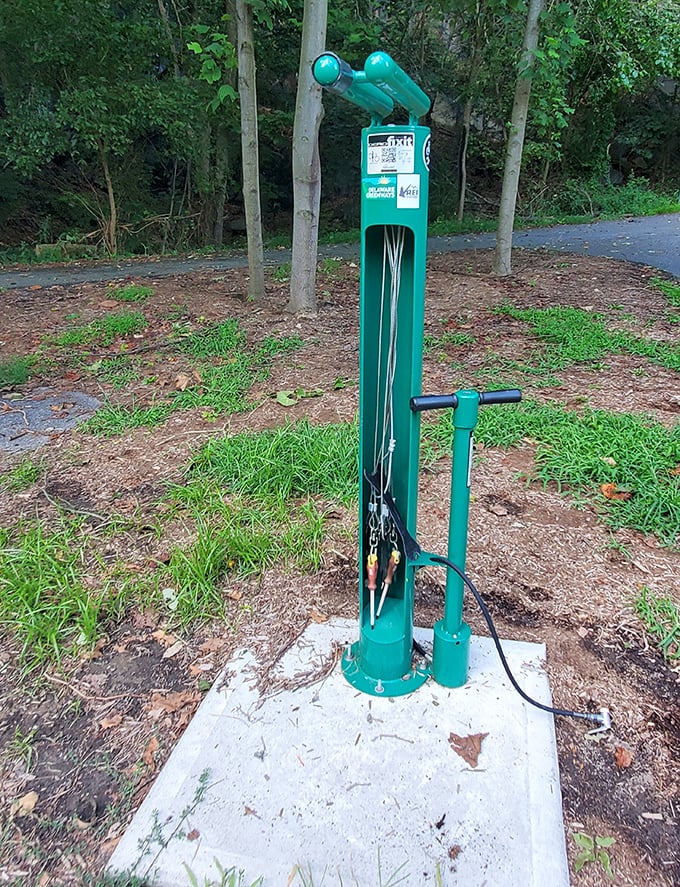 The bicycle repair station stands ready like a first aid kit for your two-wheeled companion – because flat tires happen to good people.