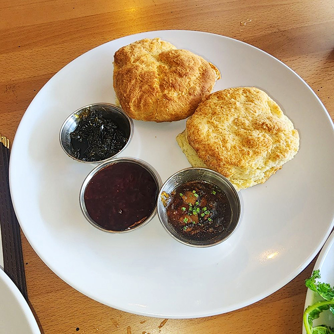 These biscuits don't need your approval – they know they're magnificent, especially when paired with that trio of house-made jams.