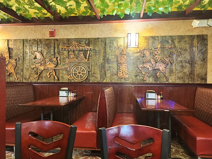Cozy booths beneath ancient-inspired artwork create the perfect setting for that inevitable moment when you whisper, "I shouldn't have that fourth plate."